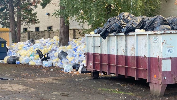 Heaps of trash bags that may contain medical waste left outside soon-to ...