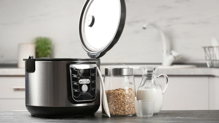 10 Unusual Foods You'd Never Think To Toss In Your Slow Cooker (But Should)