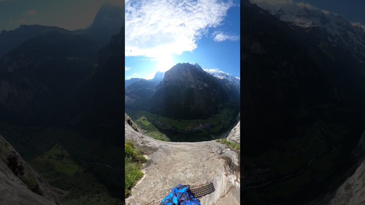 Flying POV past a waterfall