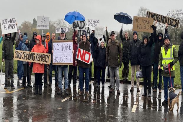Protest against plan to build 99 homes in village
