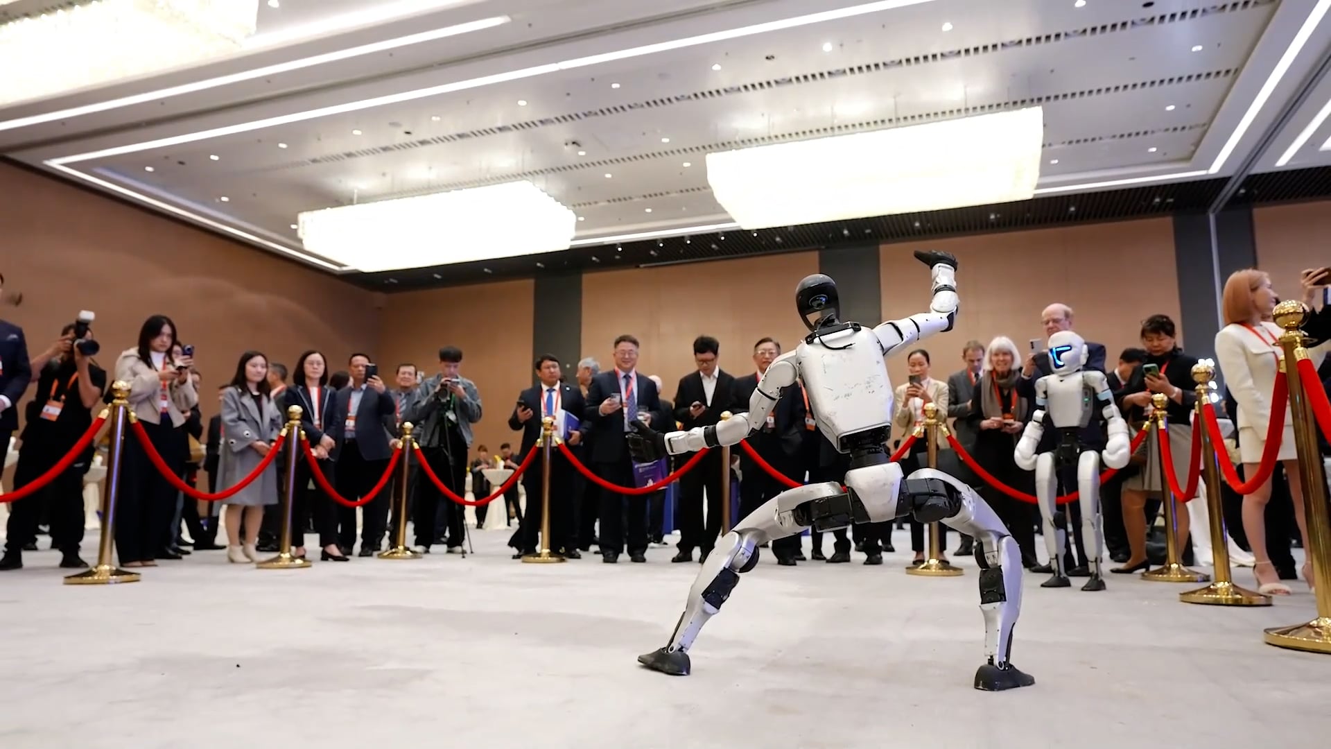 Humanoid robots show off dance moves and boxing skills