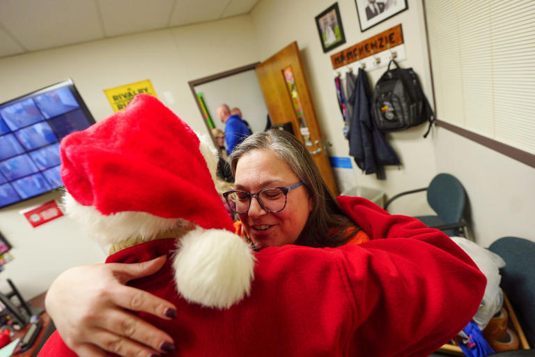 Secret Santas are back, handing out cash to strangers in metro Detroit