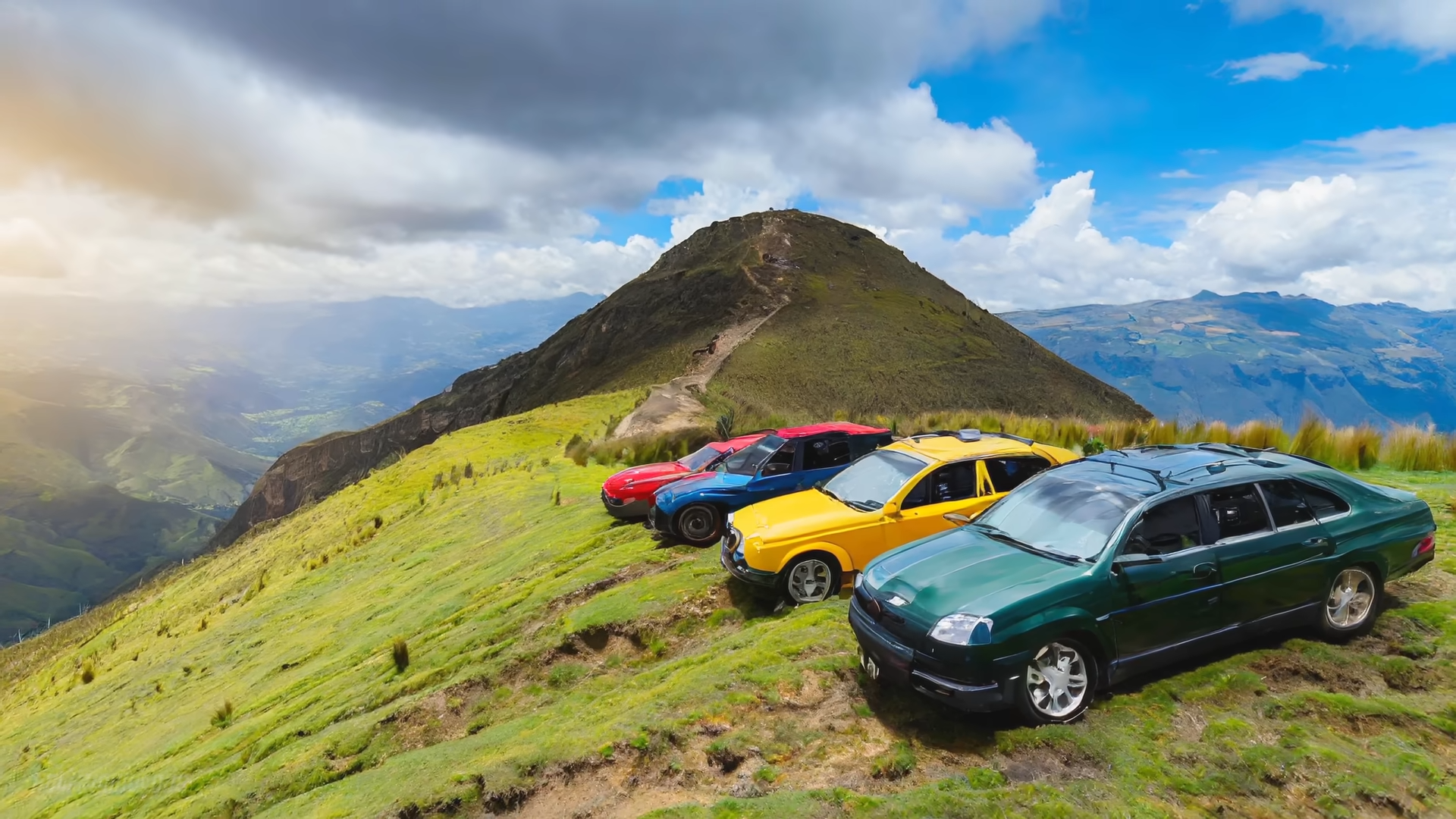 What happens when three real cars are pushed off a mountain at full speed