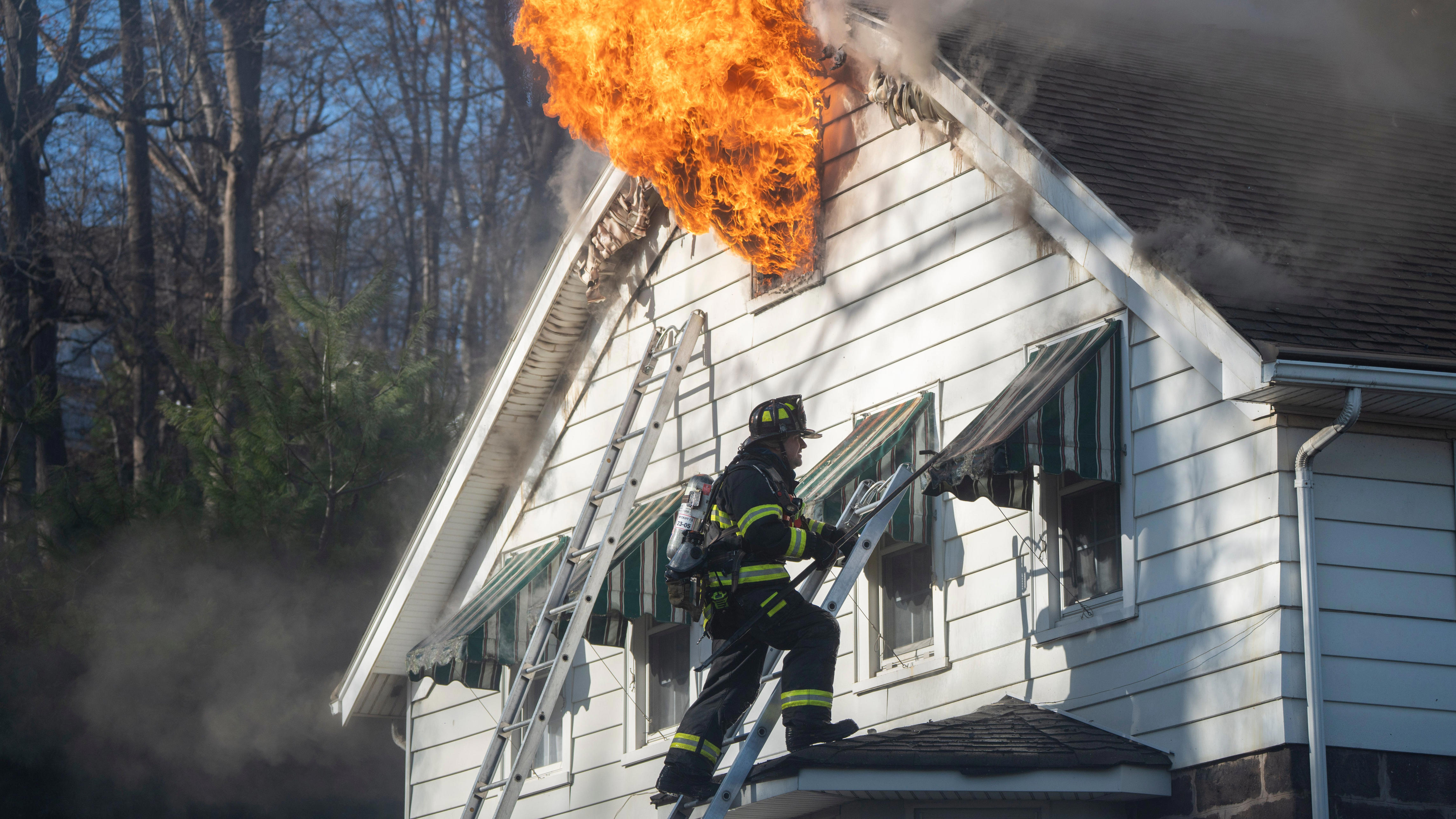 Texas woman accused of torching home, slashing fire hoses