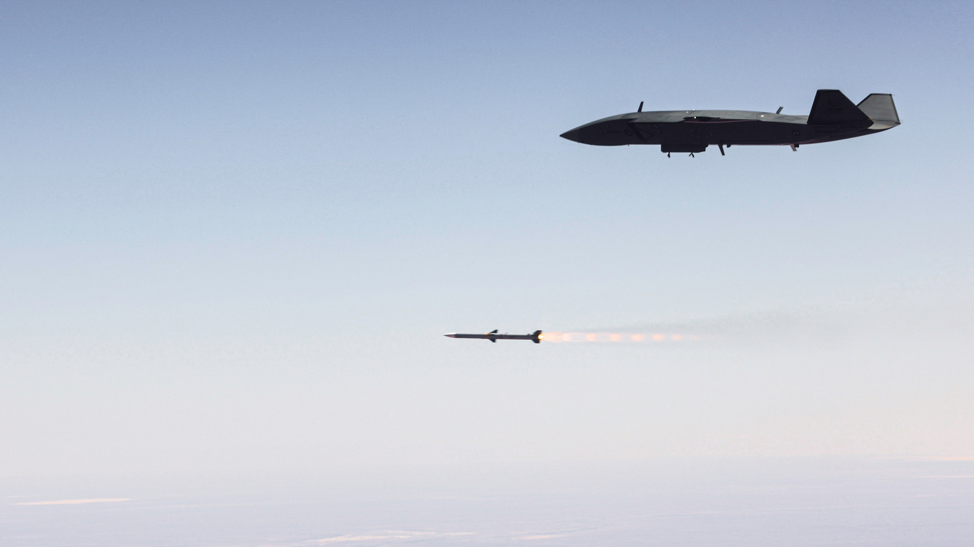 Boeing's MQ-28A Ghost Bat fires AIM-120 AMRAAM at target drone