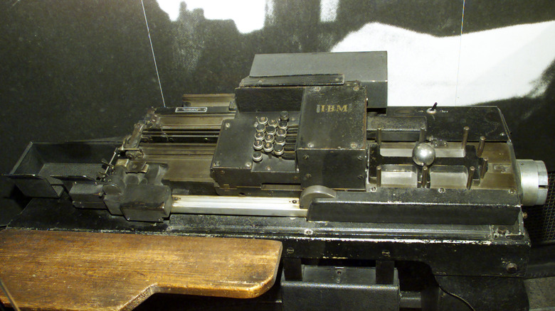 What does IBM stand for and why is it important in computer history?