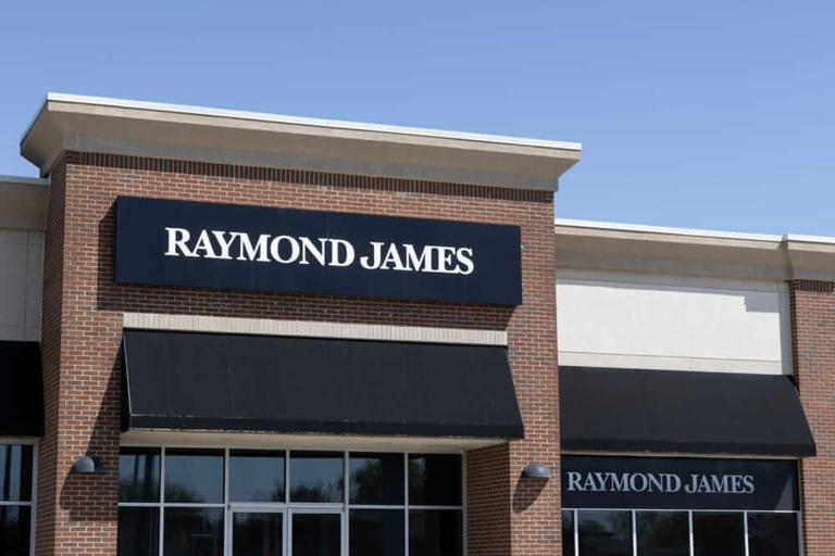 Is Raymond James Financial stock underperforming the Dow?