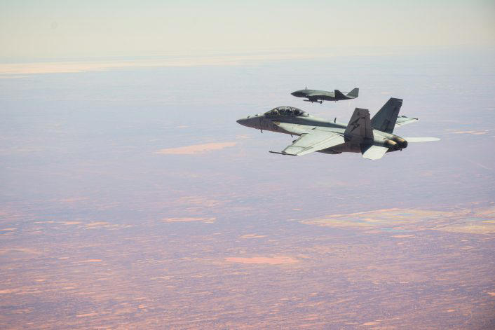 Boeing's MQ-28A Ghost Bat fires AIM-120 AMRAAM at target drone