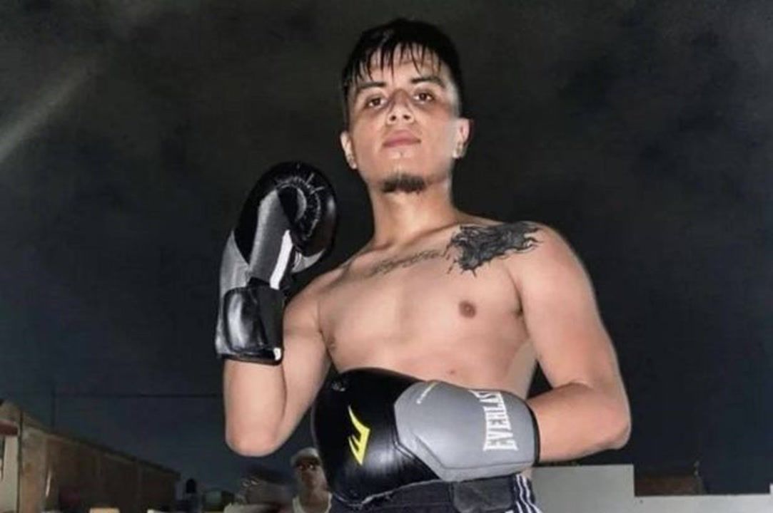 Boxing prodigy dies defending sisters in home attack