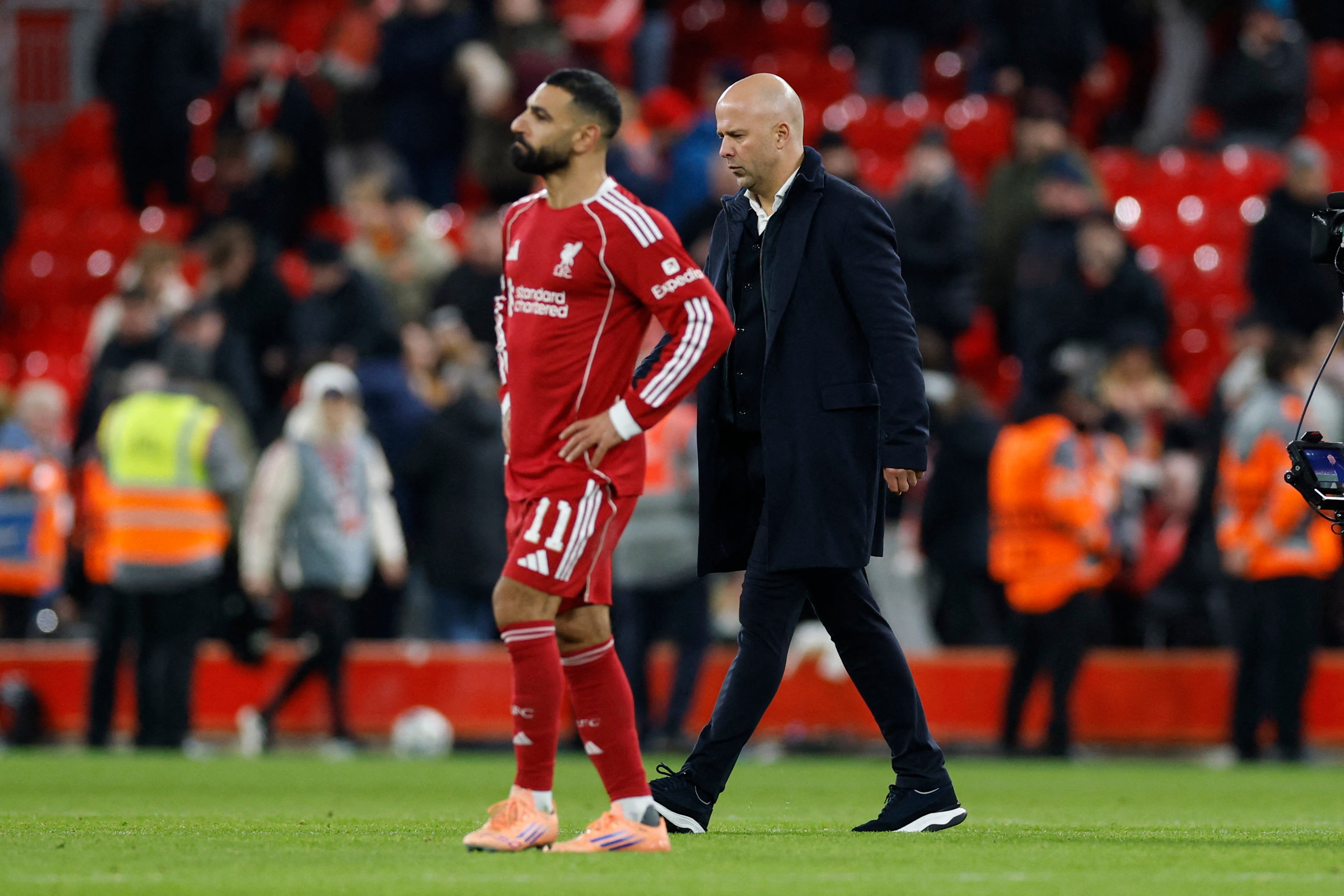 Salah pats badge and applauds fans after possible Liverpool farewell