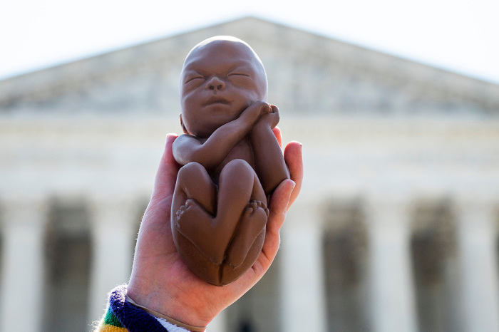 Fetal homicide charge against woman who aborted, buried her baby dismissed