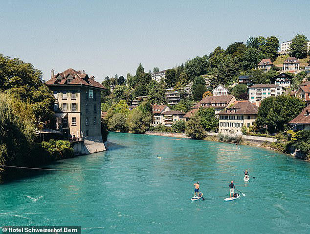 Inside the European hotel where staff swim to work - and guests can do ...