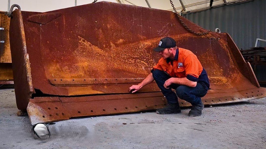 Fixing the Side Arm of a Bulldozer