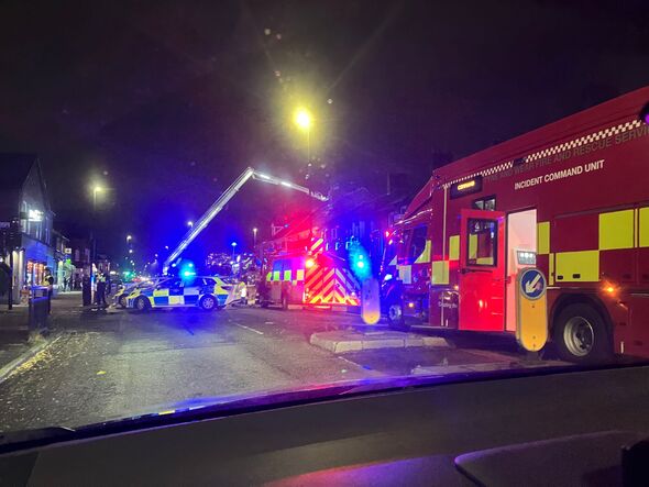 Busy UK city road 'locked down' as police and firefighters swarm area
