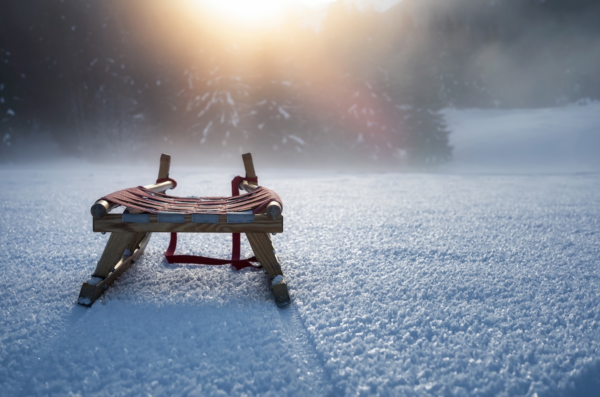Man sleds down hill on a frying pan (and other random objects)