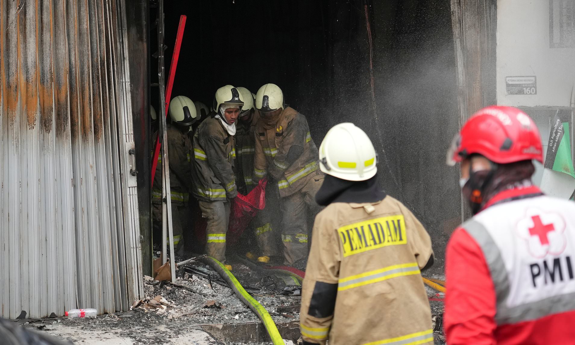 Pregnant woman is among 22 dead after fire ripped through seven-storey ...