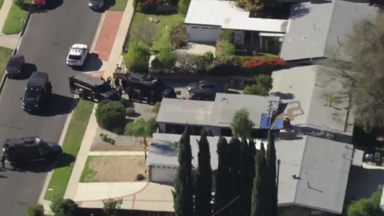 Robbery suspect found dead inside Granada Hills home after hours-long ...