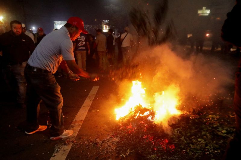 Honduran election turmoil grows as president decries 'electoral coup'