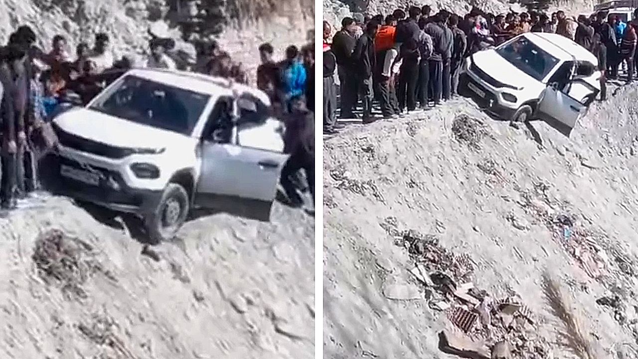 Good Samaritans pull car off the edge of cliff in India