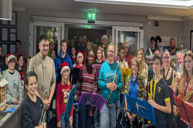 Residents at care home celebrate Christmas with carol singing