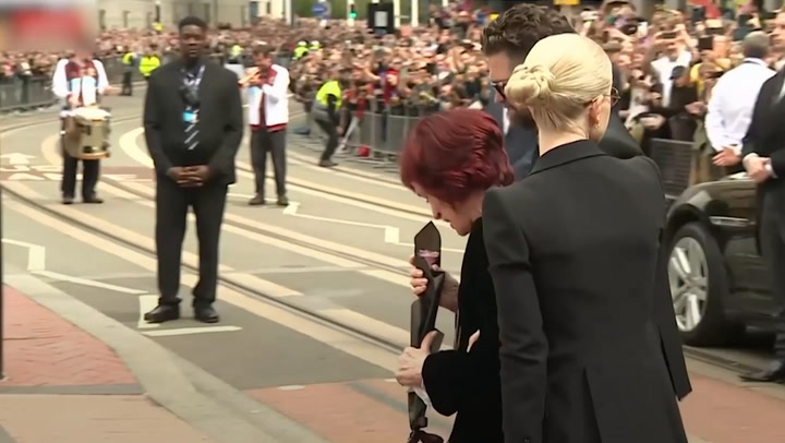 Watch: Sharon Osbourne comforted by kids during Ozzy's funeral procession