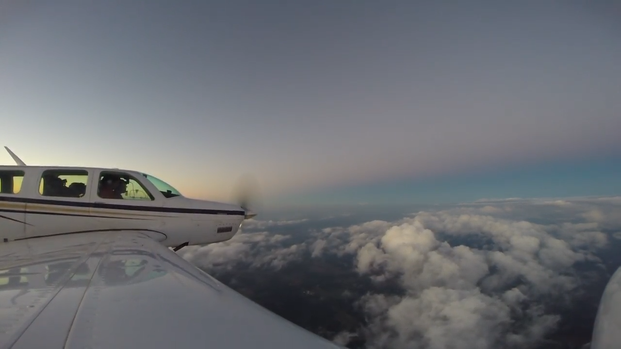 Watch pilots fly through rain and clouds to reach the Red Bull Air Races