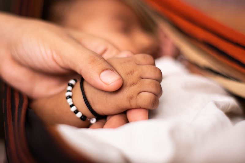 26-day-old infant dies after being accidentally crushed between parents ...