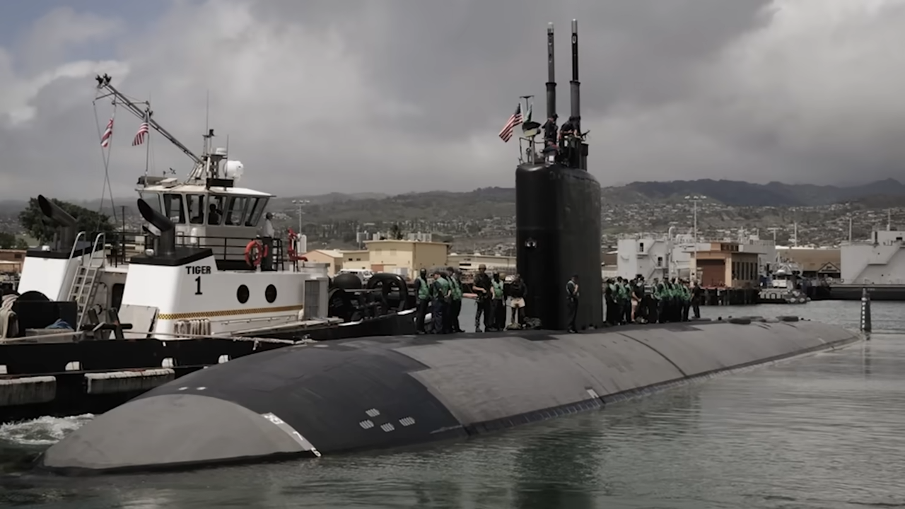 What happened when a submarine surfaced under a fishing ship