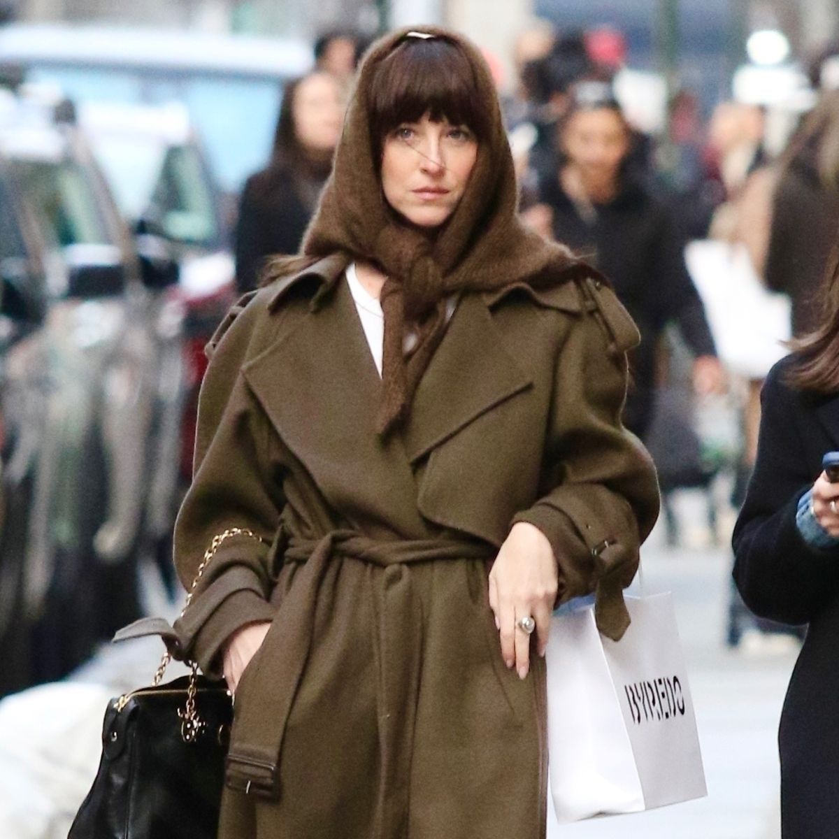 Dakota Johnson just stepped out in this winter's must-have accessory