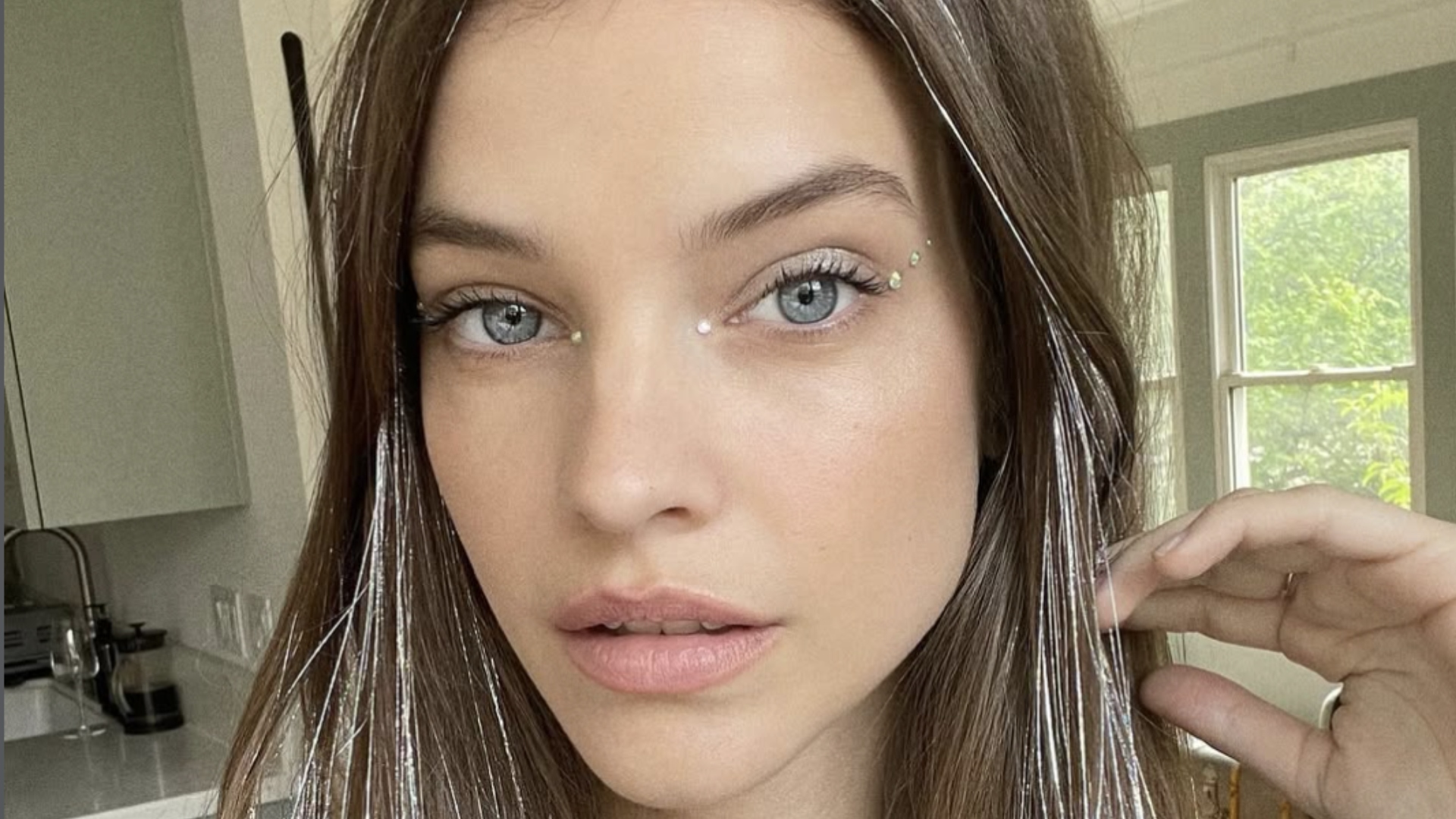 Wearing a skirt, this Hungarian model shows off a bold winter look