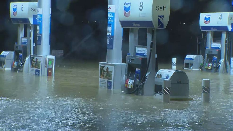 Rivers flood, roads swamped, people evacuated as rain pounds western ...