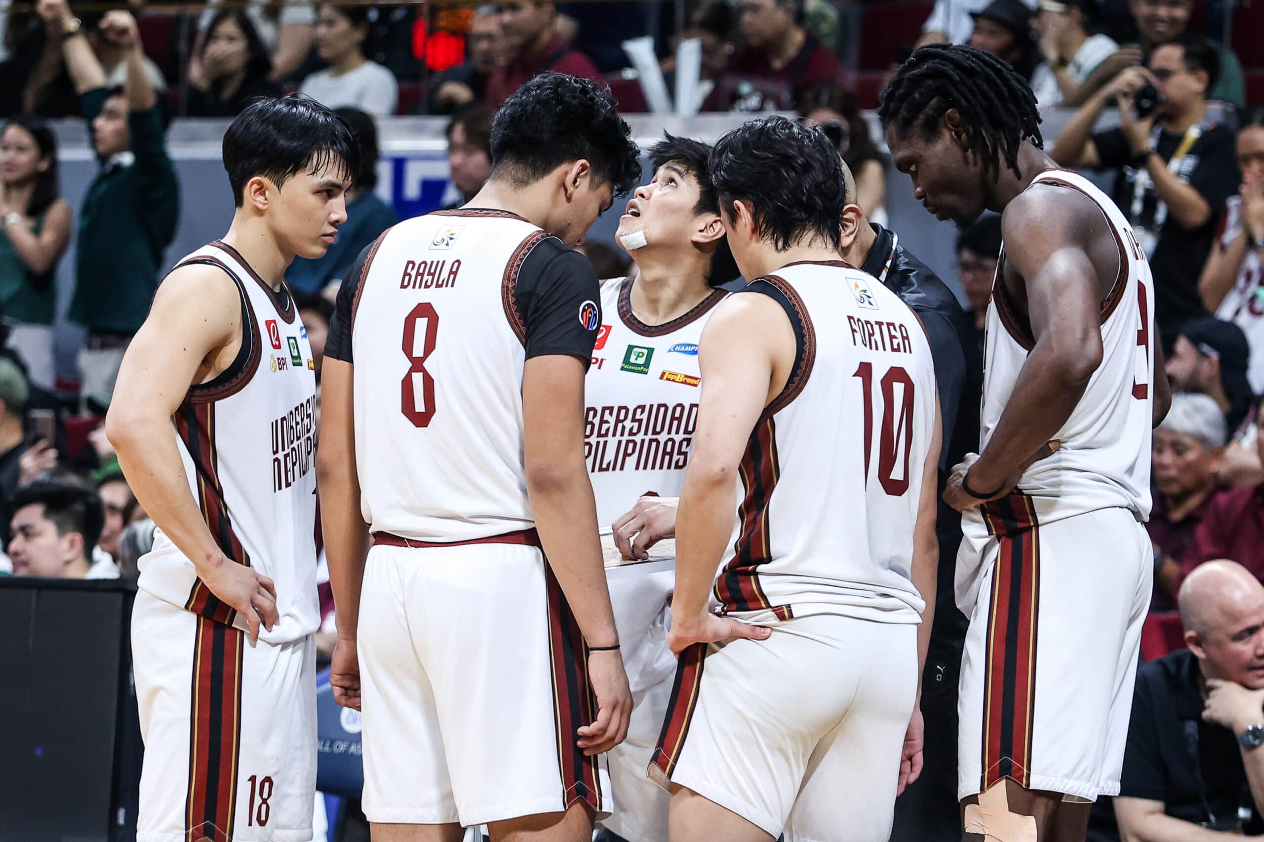 UAAP finals: Harold Alarcon shines, but UP needs more vs La Salle