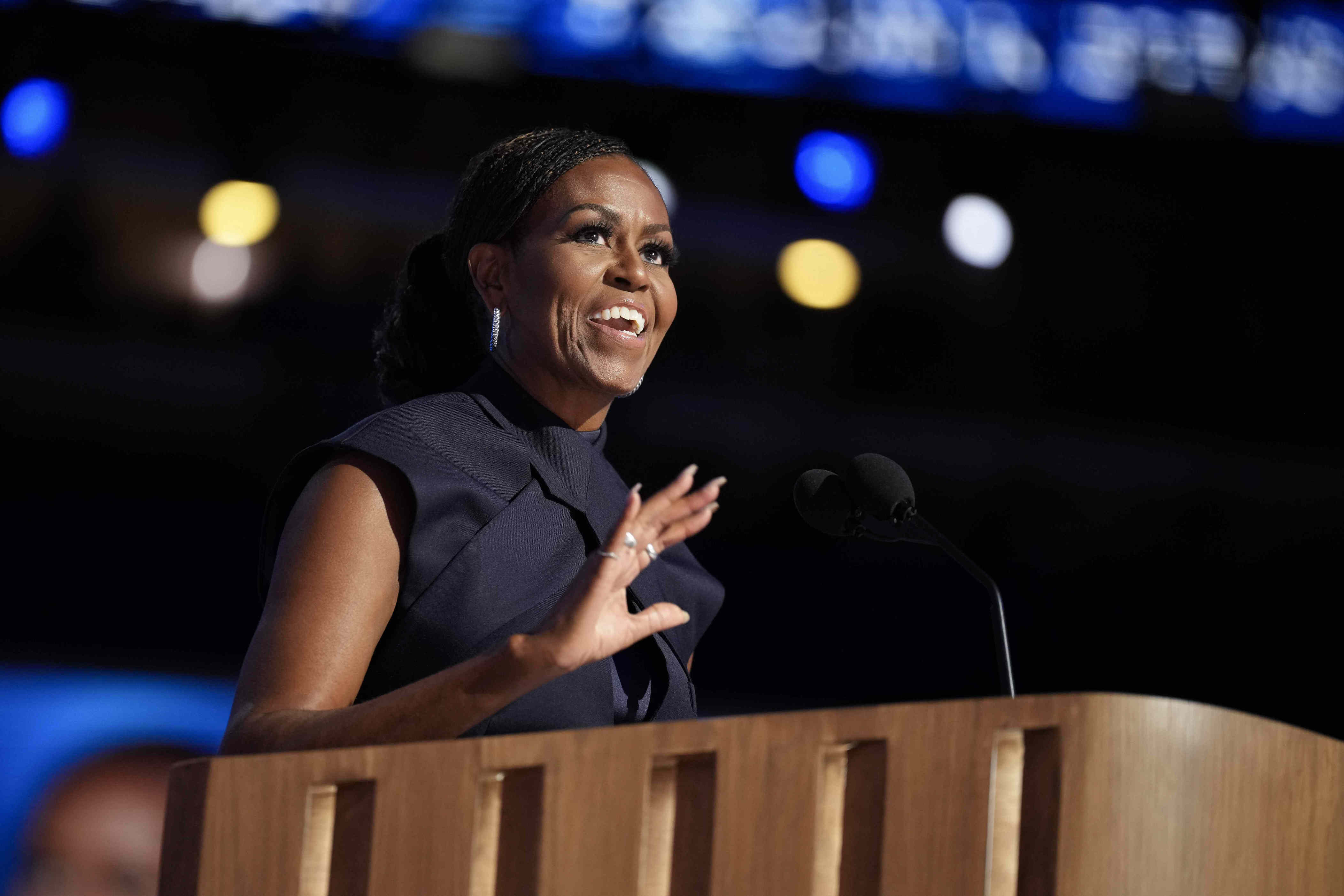Michelle Obama embraces moody glam in a sheer LBD with a zipper running ...