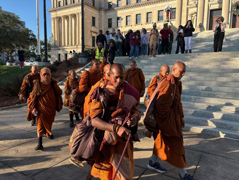 Buddhist monks on 'Walk for Peace' arrive at Mississippi State Capitol