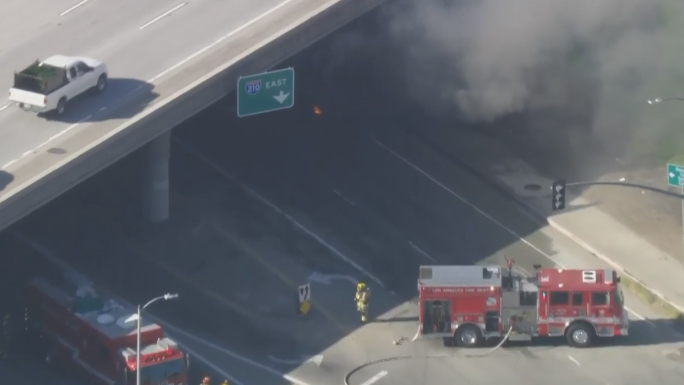 Electric school bus catches fire, burns on Los Angeles streets