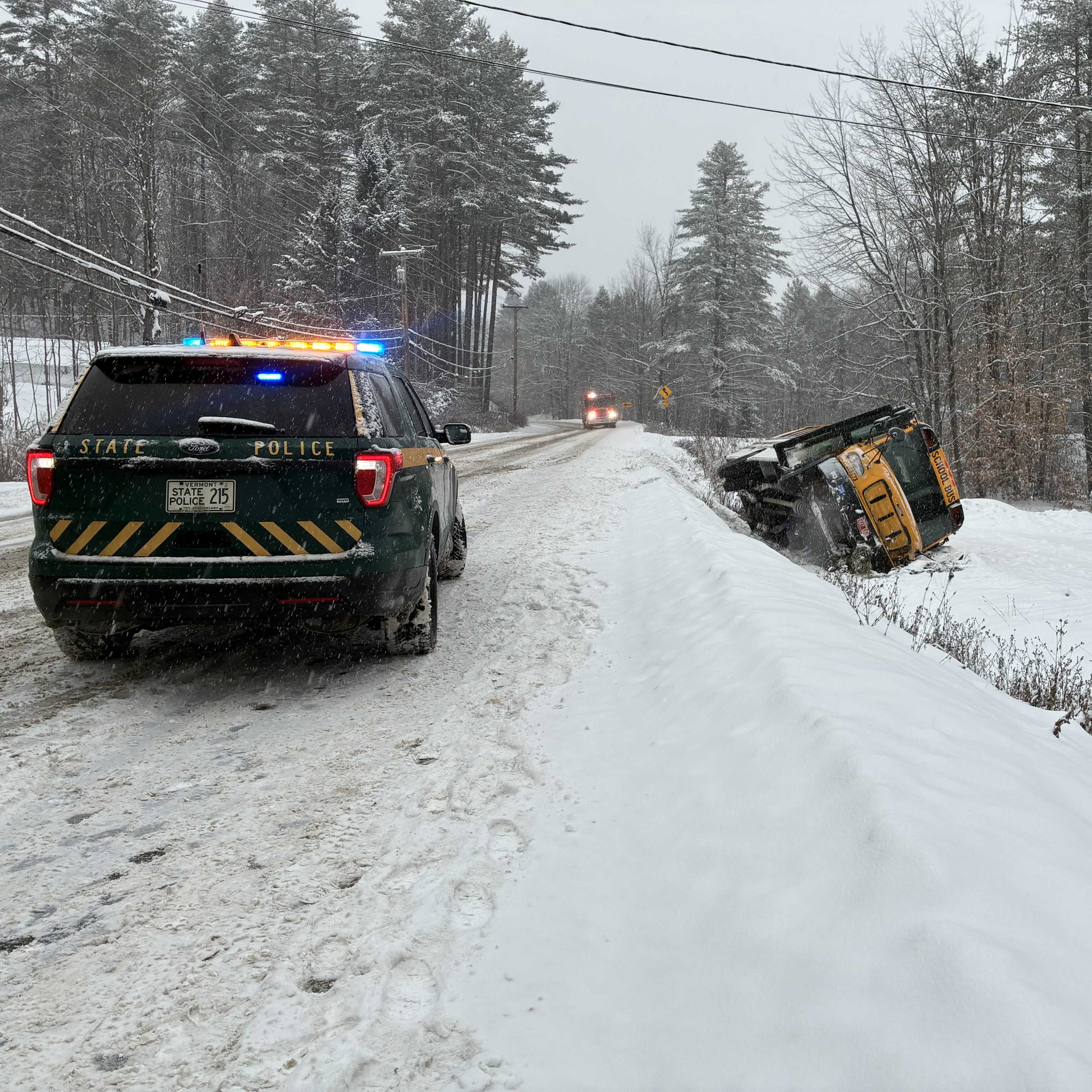 Road in Middlesex closes after empty school bus rolls into ditch