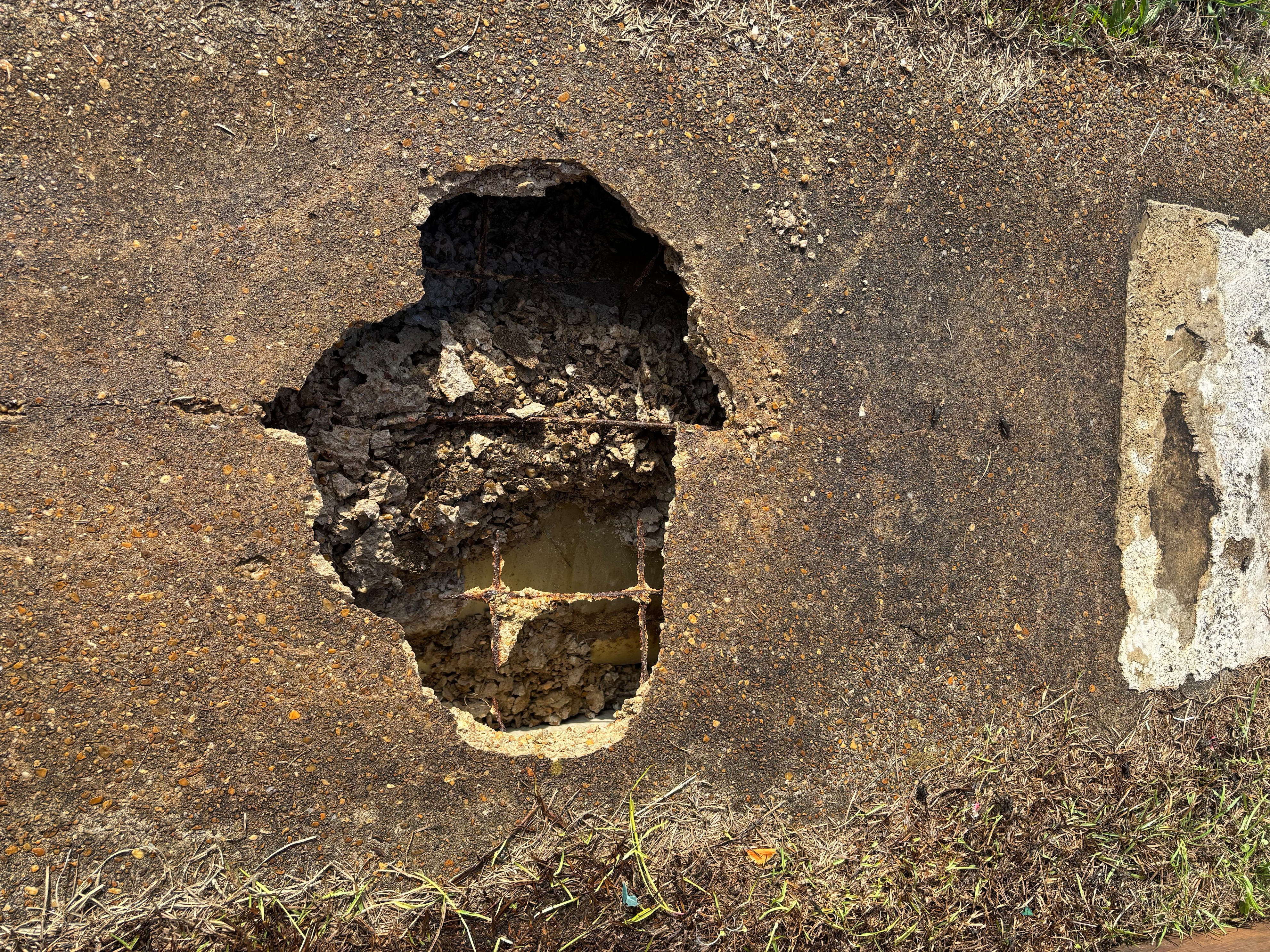 West Alabama family finds hole in concrete covering loved one’s grave