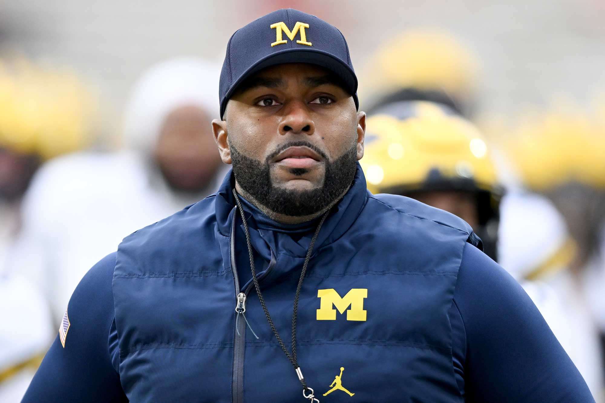 Michigan football head coach detained by police after he's fired over ...