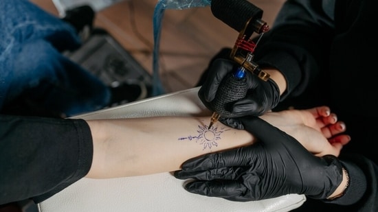 Got a fresh tattoo? Tattoo artist shares the dos and don'ts of workouts ...
