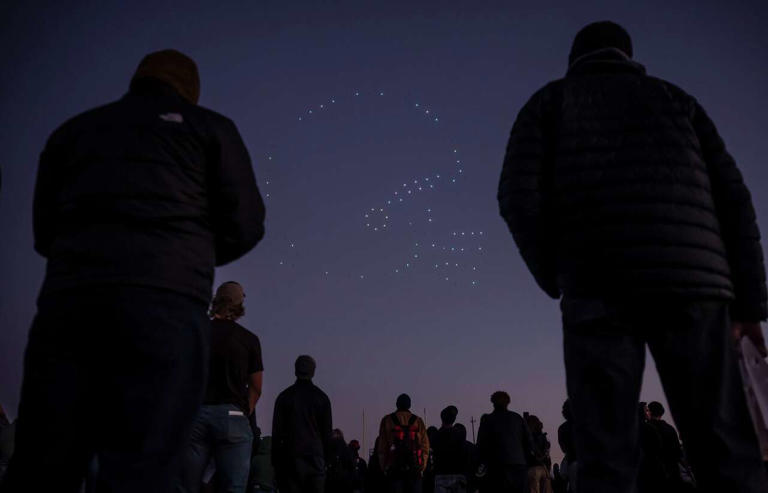 'It's surreal': Hundreds memorialize Laney College coach John Beam
