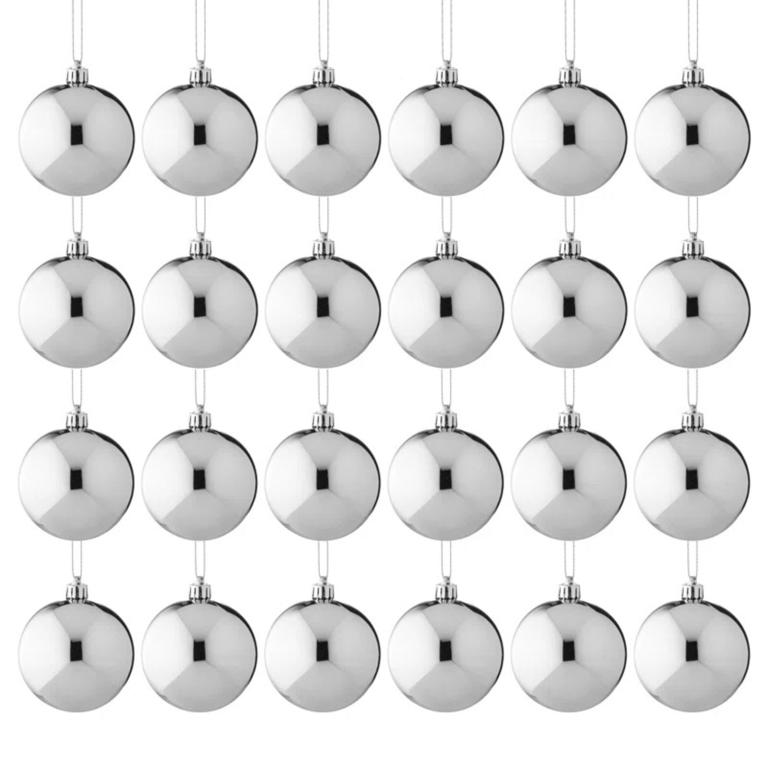 25 years on, Charlize Theron’s opulent feathered Christmas tree remains ...