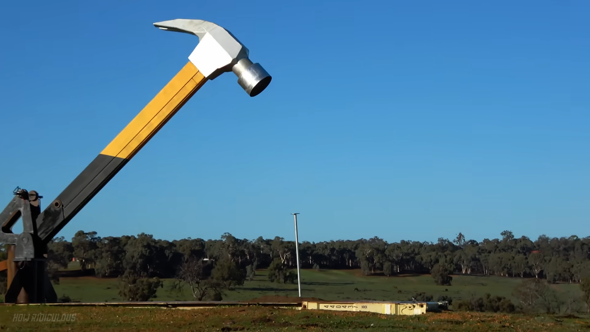 What happens when a 3-ton hammer hits a steel nail the size of a tree