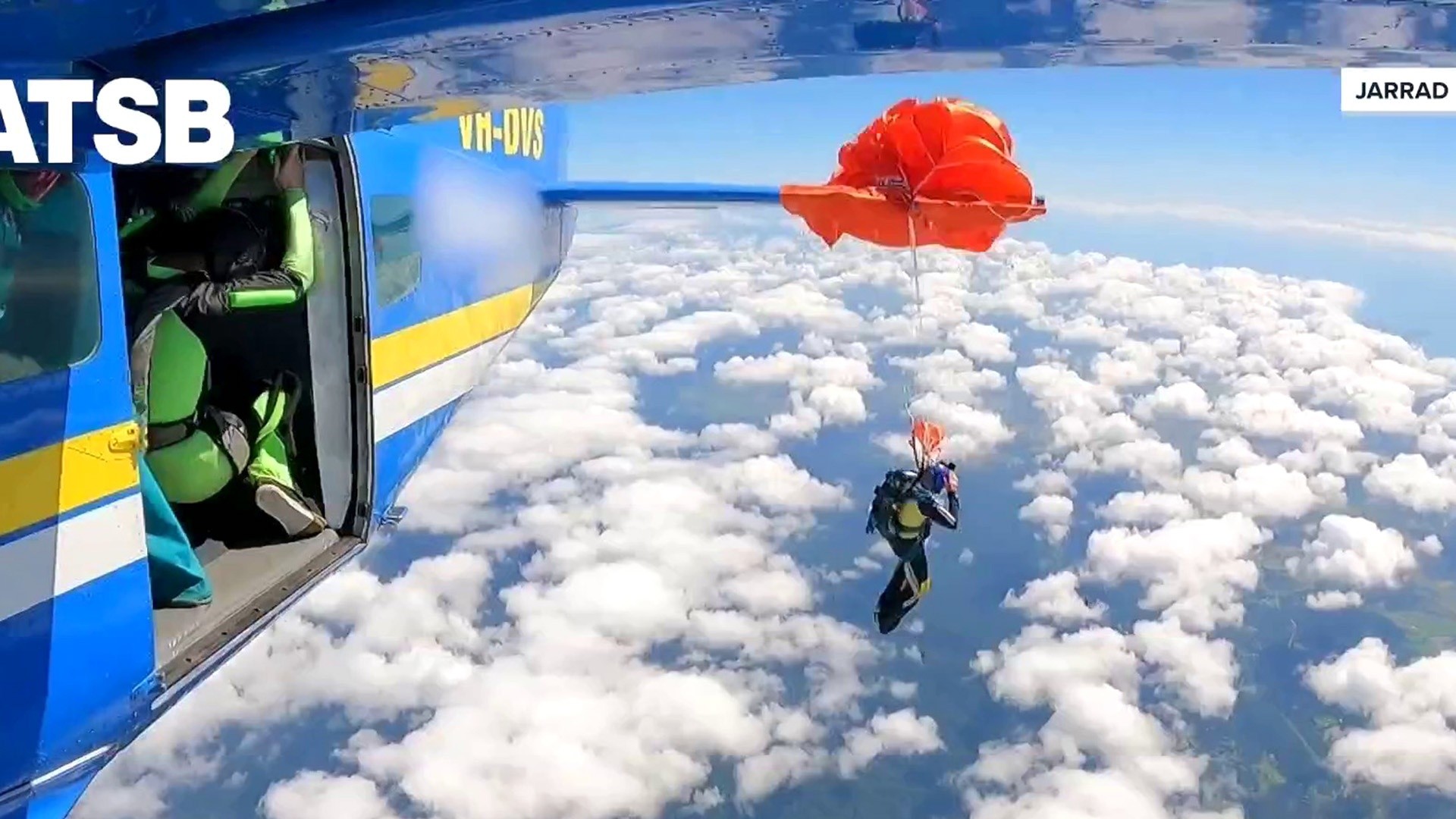 Video: Skydiver's parachute gets caught on plane's wing
