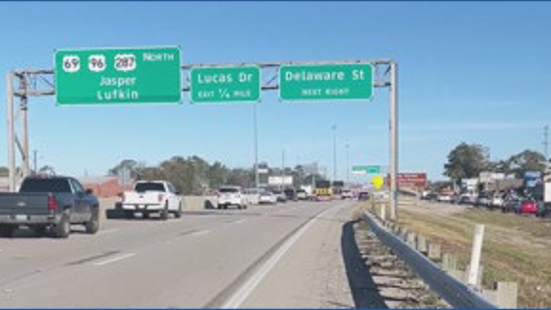Traffic snarled along northbound US Hwy 69 after truck loses load of rocks