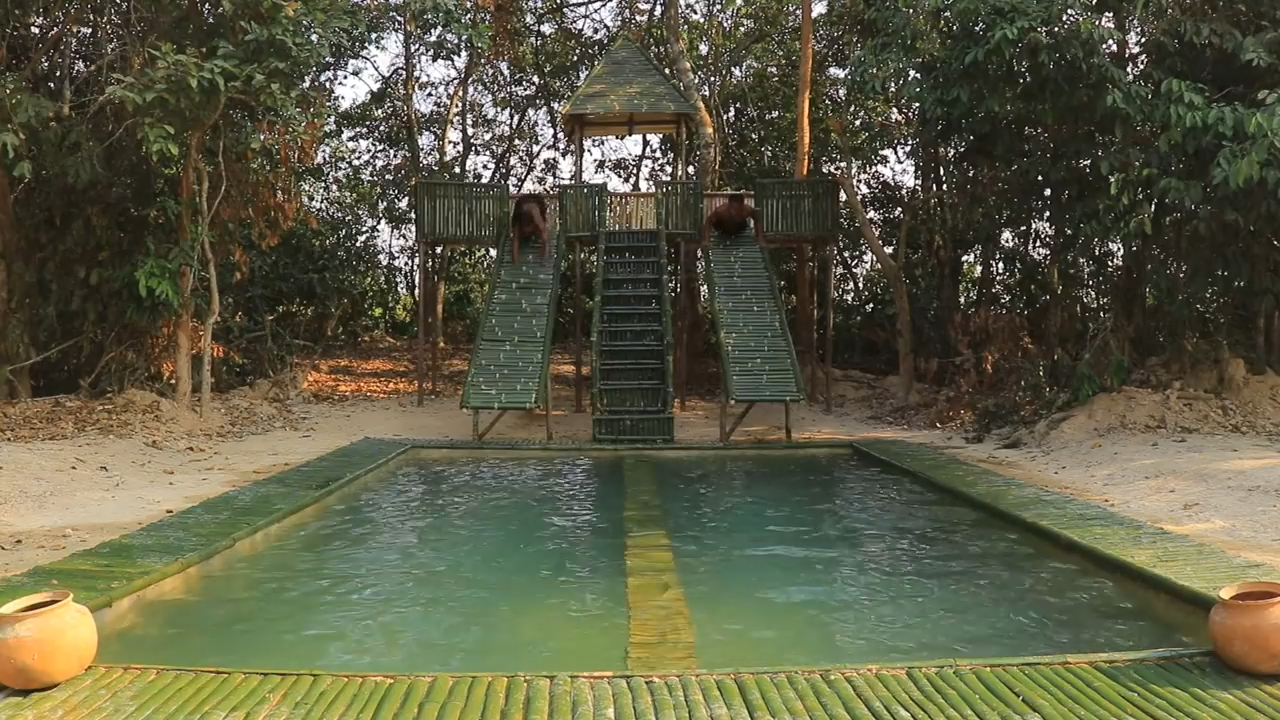 How twin bamboo water slides were built for a racing pool