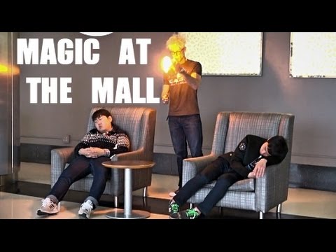 Magician uses magic to trick people at the mall