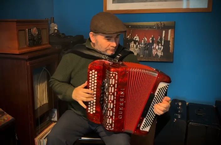 Daniel McPhee plays the accordion