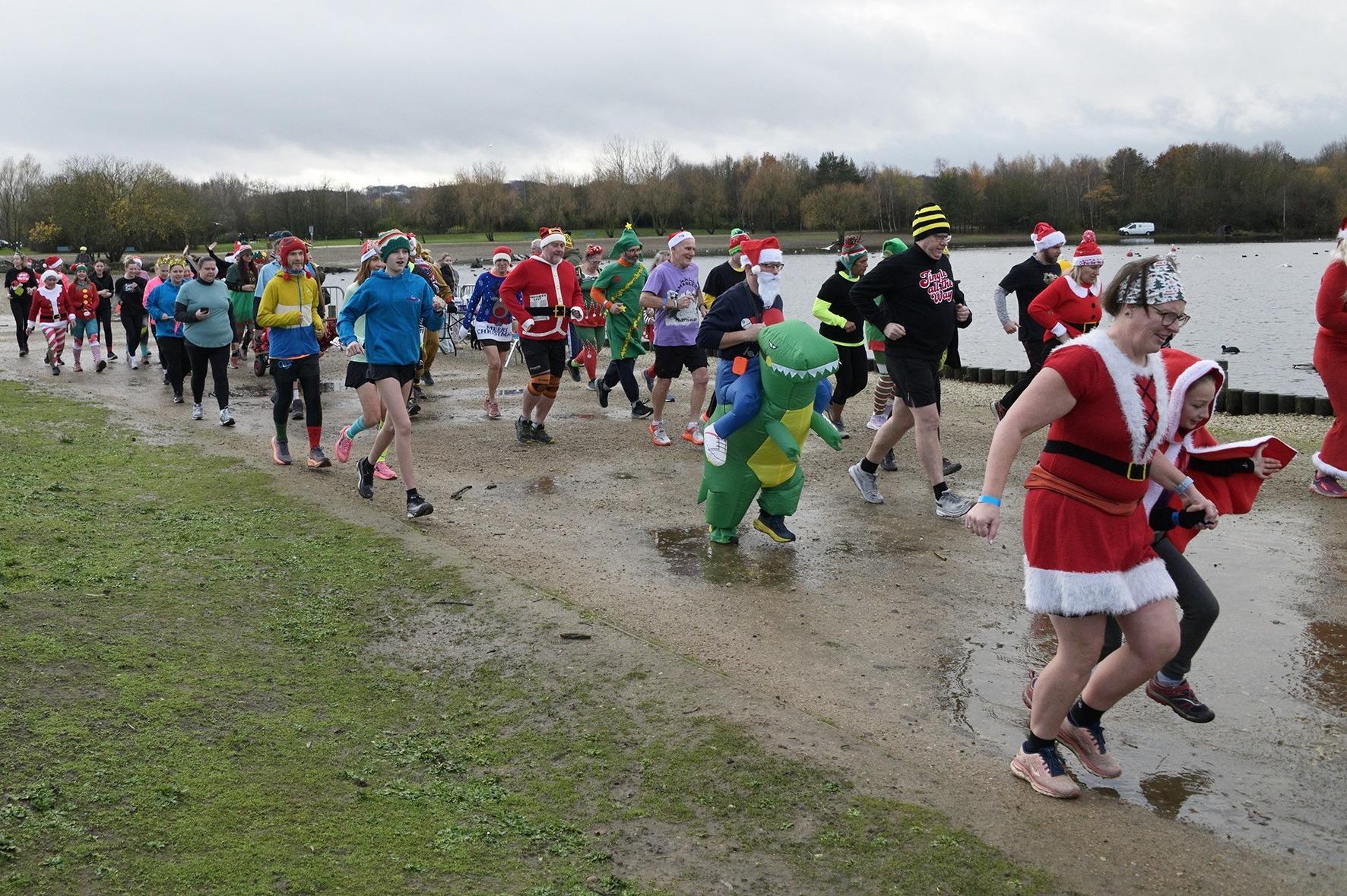 Hundreds bring festive cheer with fun run