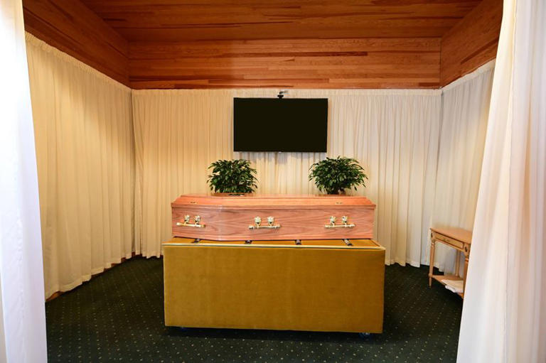 Dad forced to scoop out son's liquefied brain after funeral home's ...