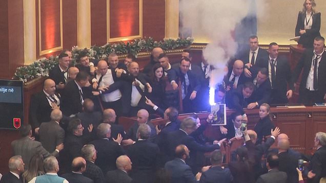 Albanian politician sets off flares in parliament after corruption ...